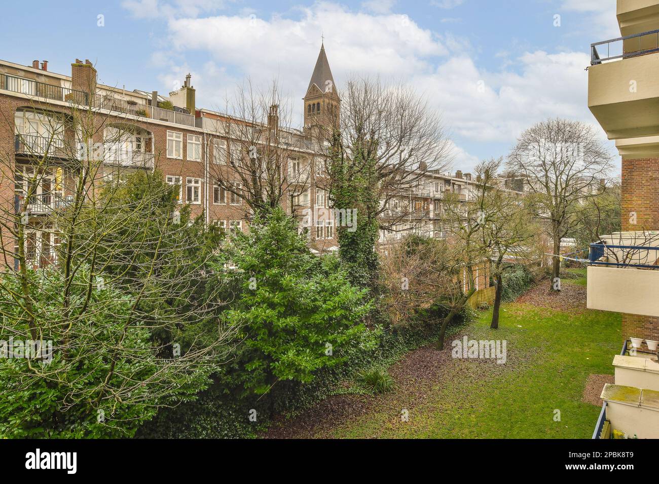 an outside area with trees and buildings in the background, as seen ...