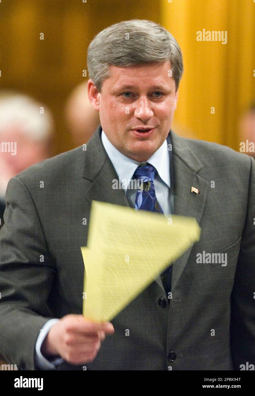 Canadian Prime Minister Stephen Harper stands in the House of Commons ...