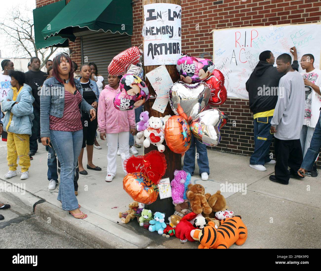 Neighbors set up a memorial Monday, April 23, 2007, in Cleveland for 15 ...