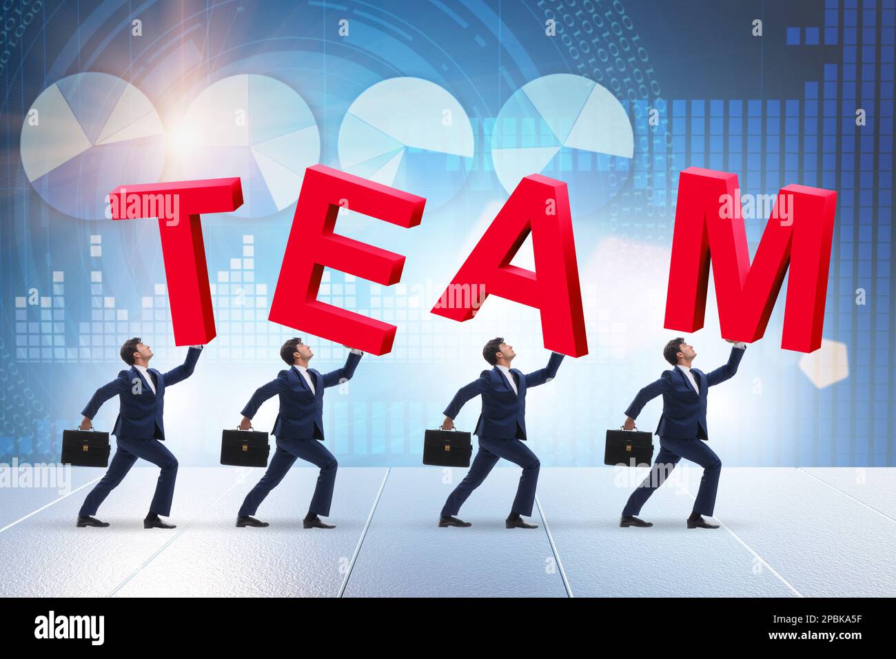 Teamwork concept with the people carrying team letters Stock Photo - Alamy