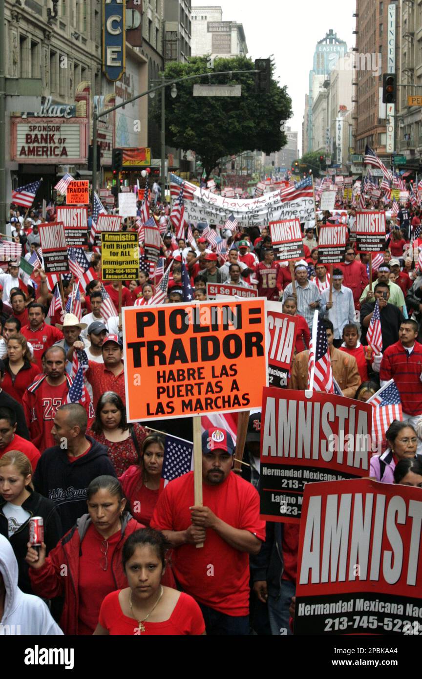 ** ADVANCE WEEKEND APRIL 28-29 ** A demonstrator carries a sign ...