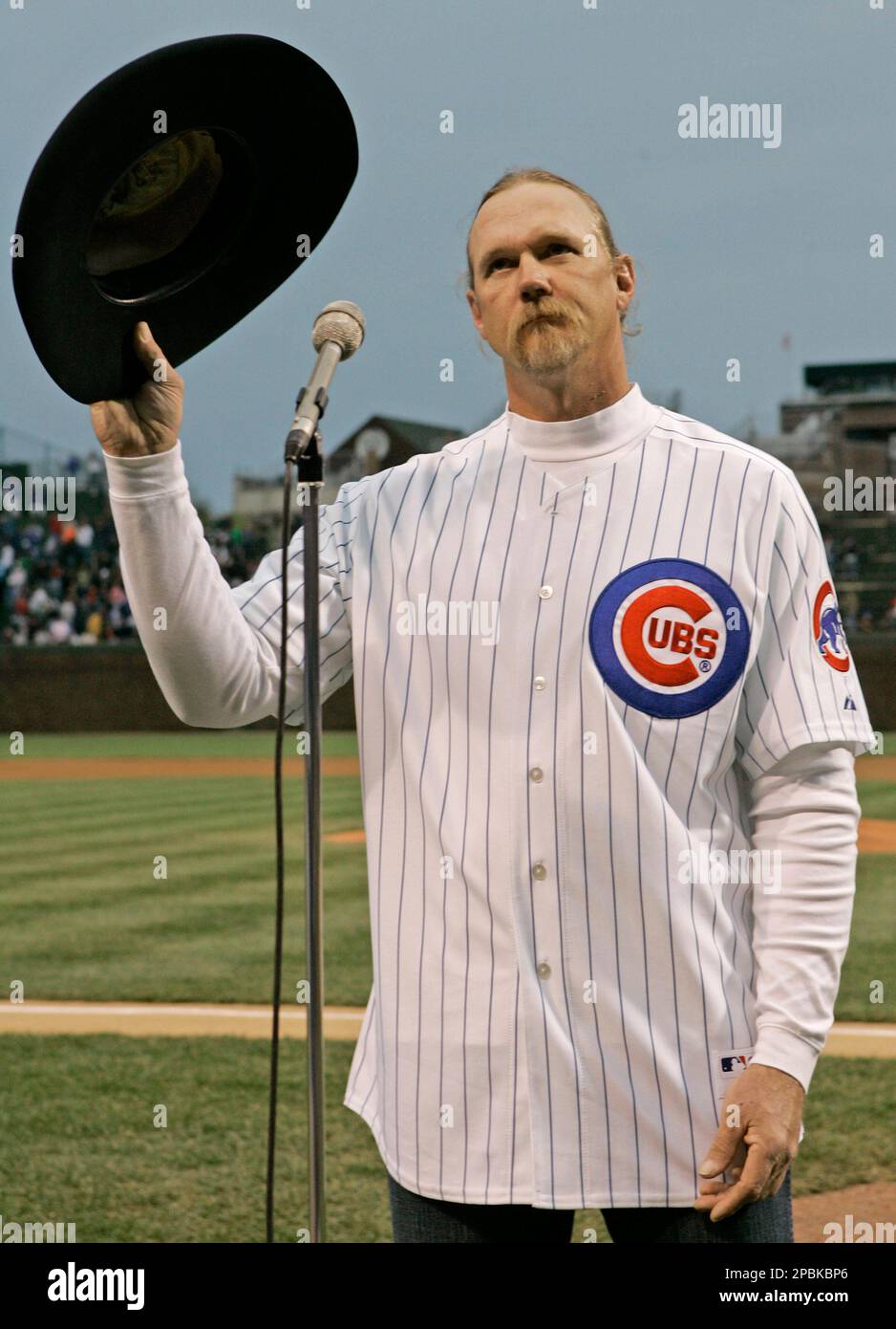 Country recording artist Trace Adkins tips his hat after singing the ...