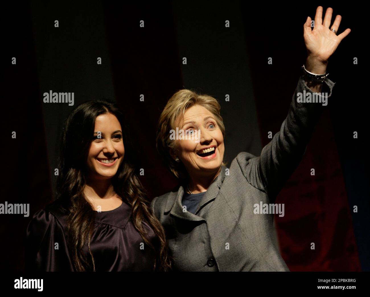 Senator Hillary Rodham Clinton, right, poses for a picture with singer ...