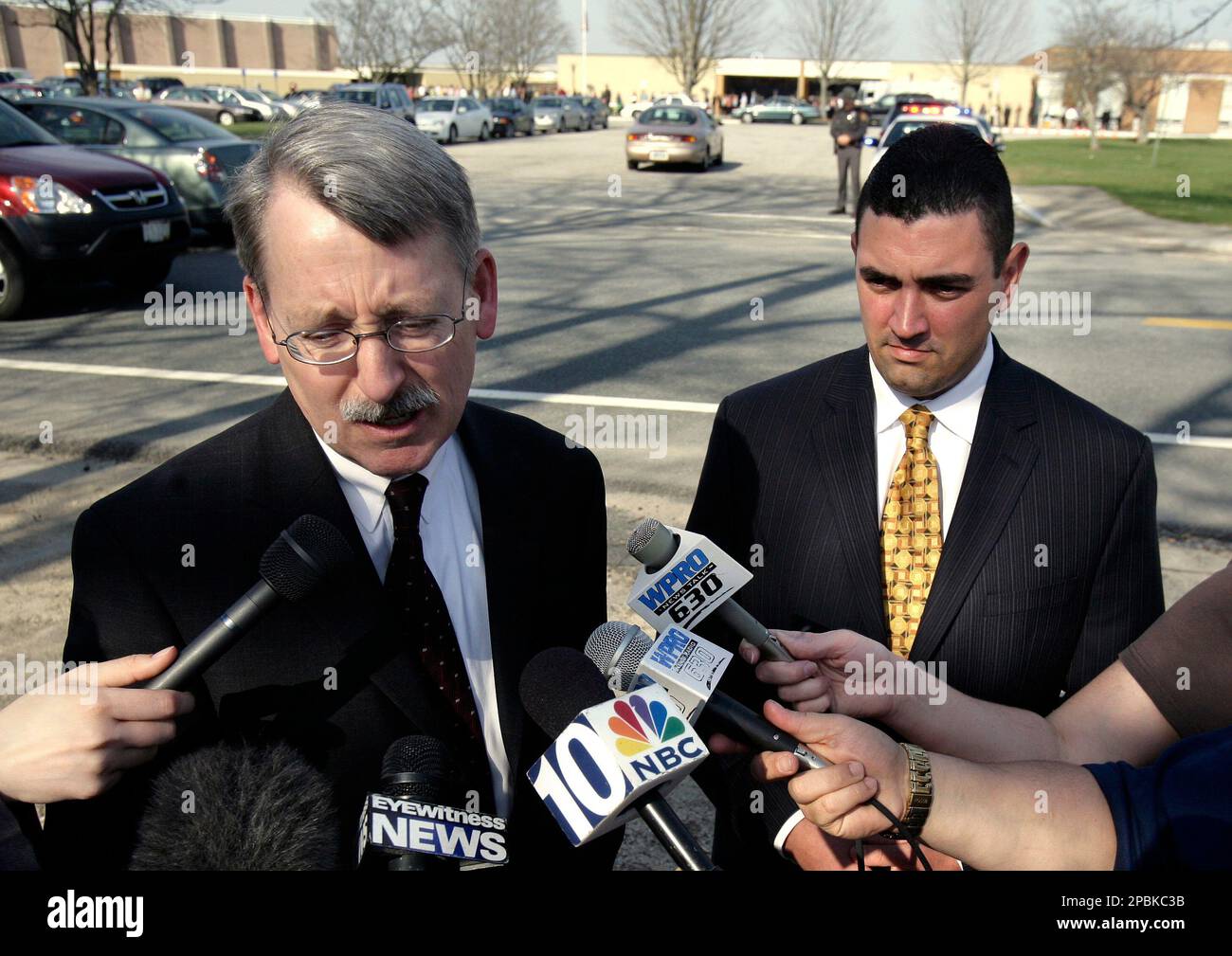 Family friend Paul Gillogly, left, and Lincoln High School Principal ...