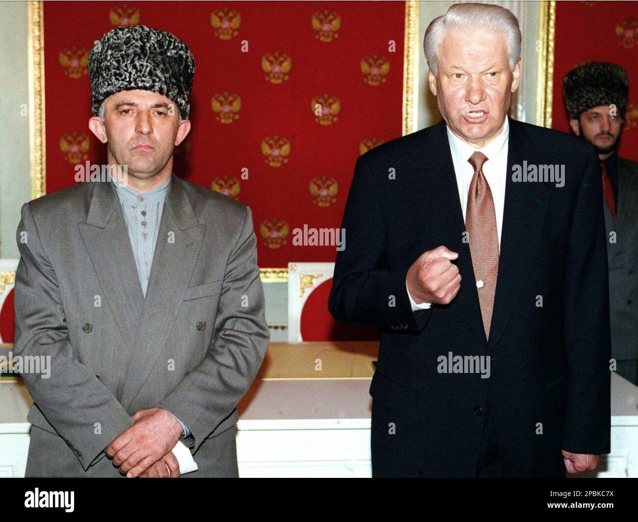 ** FILE ** Russian President Boris Yeltsin and Chechen President Aslan ...