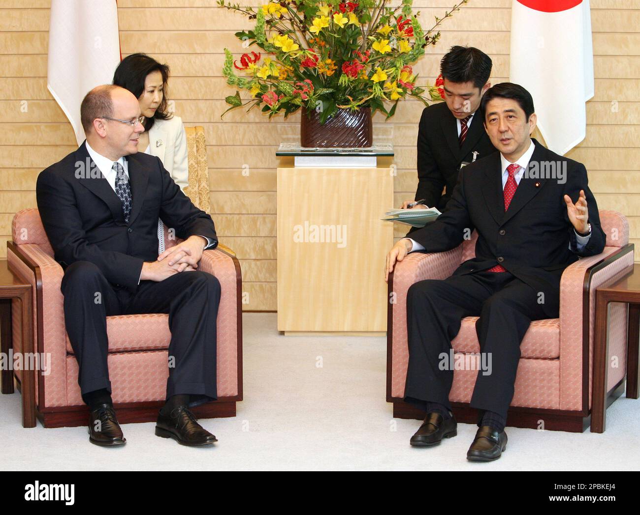 Prince Albert II of Monaco, left, listens to Japanese Prime Minister ...