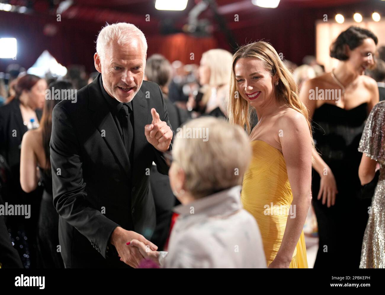 Martin McDonagh, left, and Kerry Condon arrive at the Oscars on Sunday ...