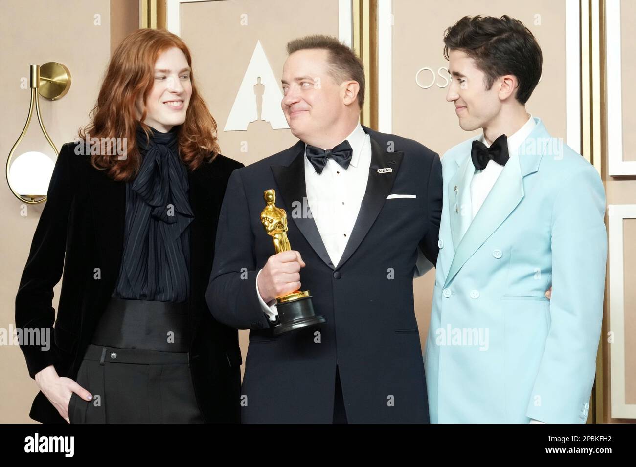 Brendan Fraser, center, winner of the award for best performance by an ...