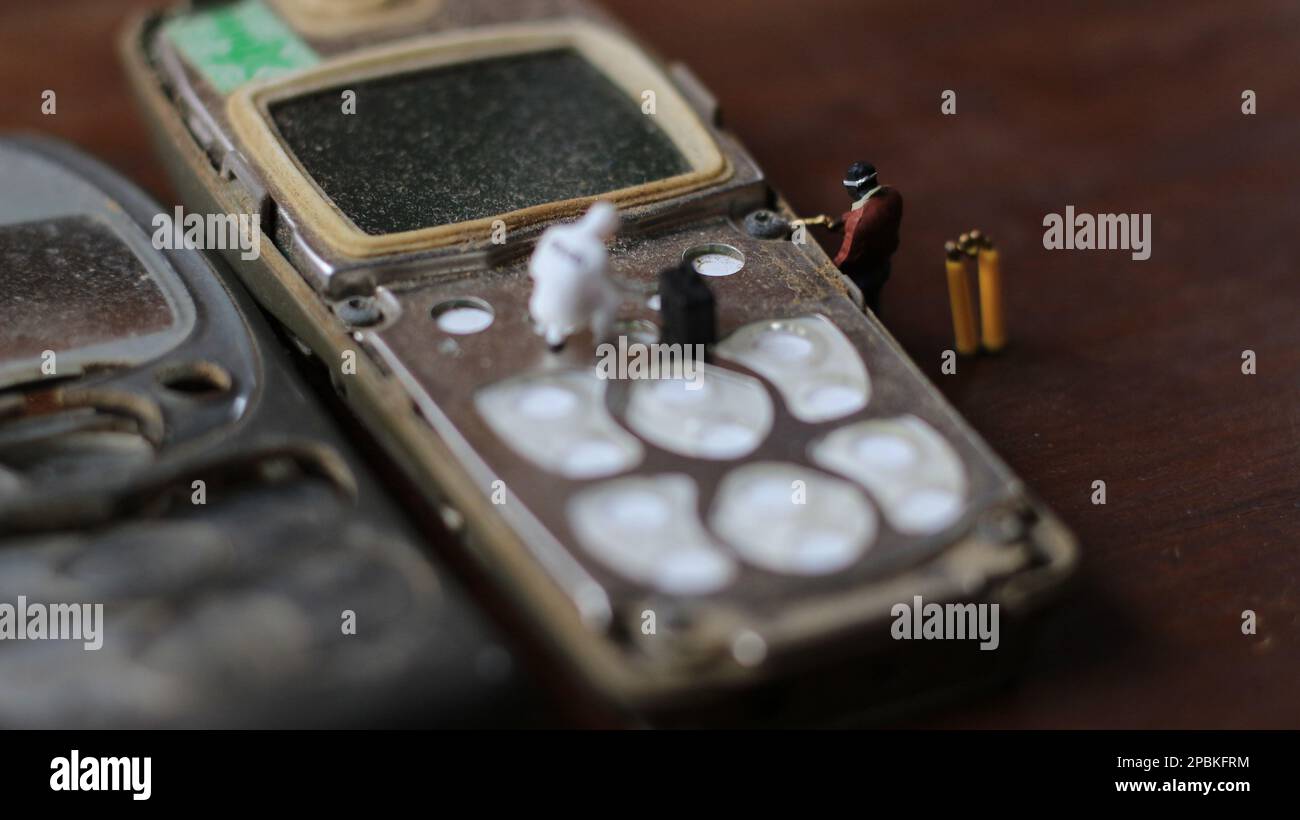 Micro miniature repairman hi-res stock photography and images - Alamy