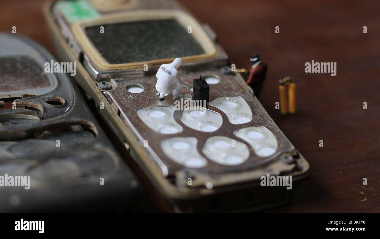 Micro miniature repairman hi-res stock photography and images - Alamy