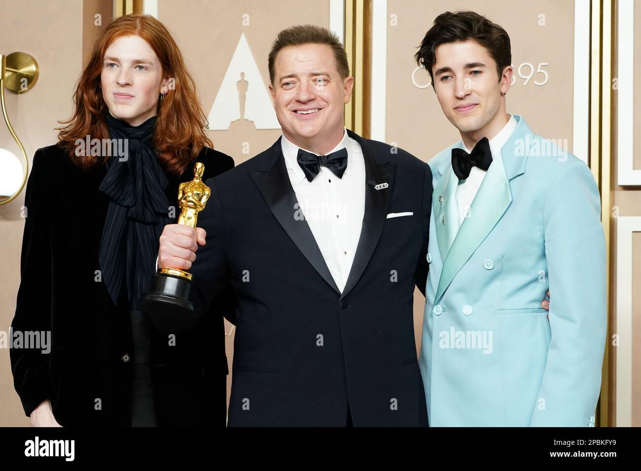 Brendan Fraser, center, winner of the award for best performance by an ...