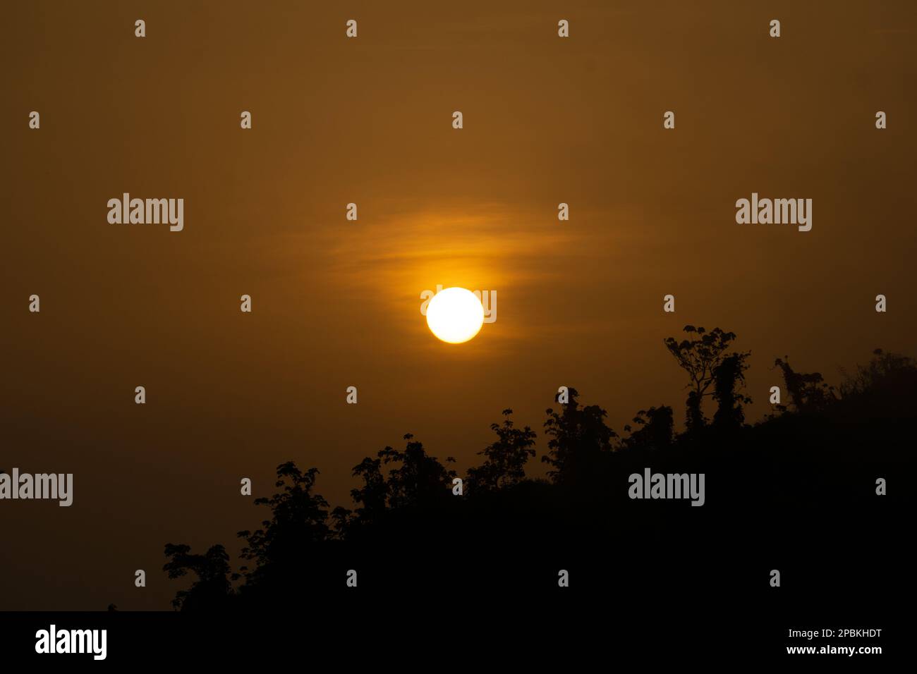 Beautiful sunrise view. Clouds on one side and the sun rising over the ...