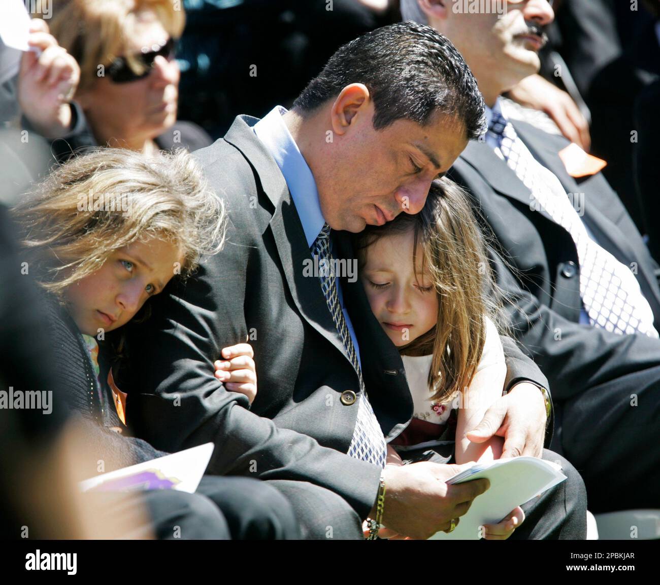 Unidentified mourners attend the memorial service for Reema Samaha,at ...
