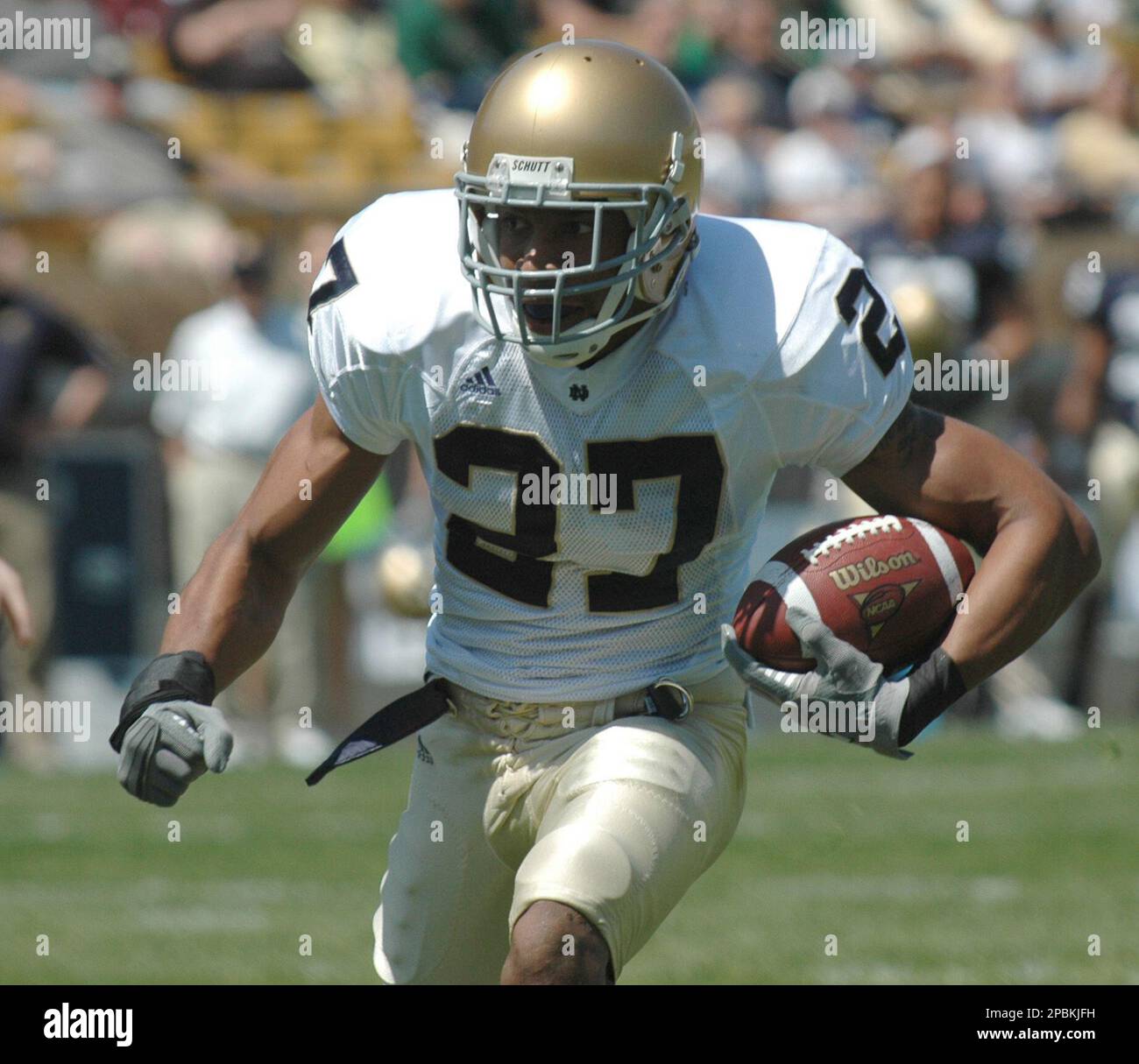 Notre Dame safety David Bruton heads towards the end zone after an ...