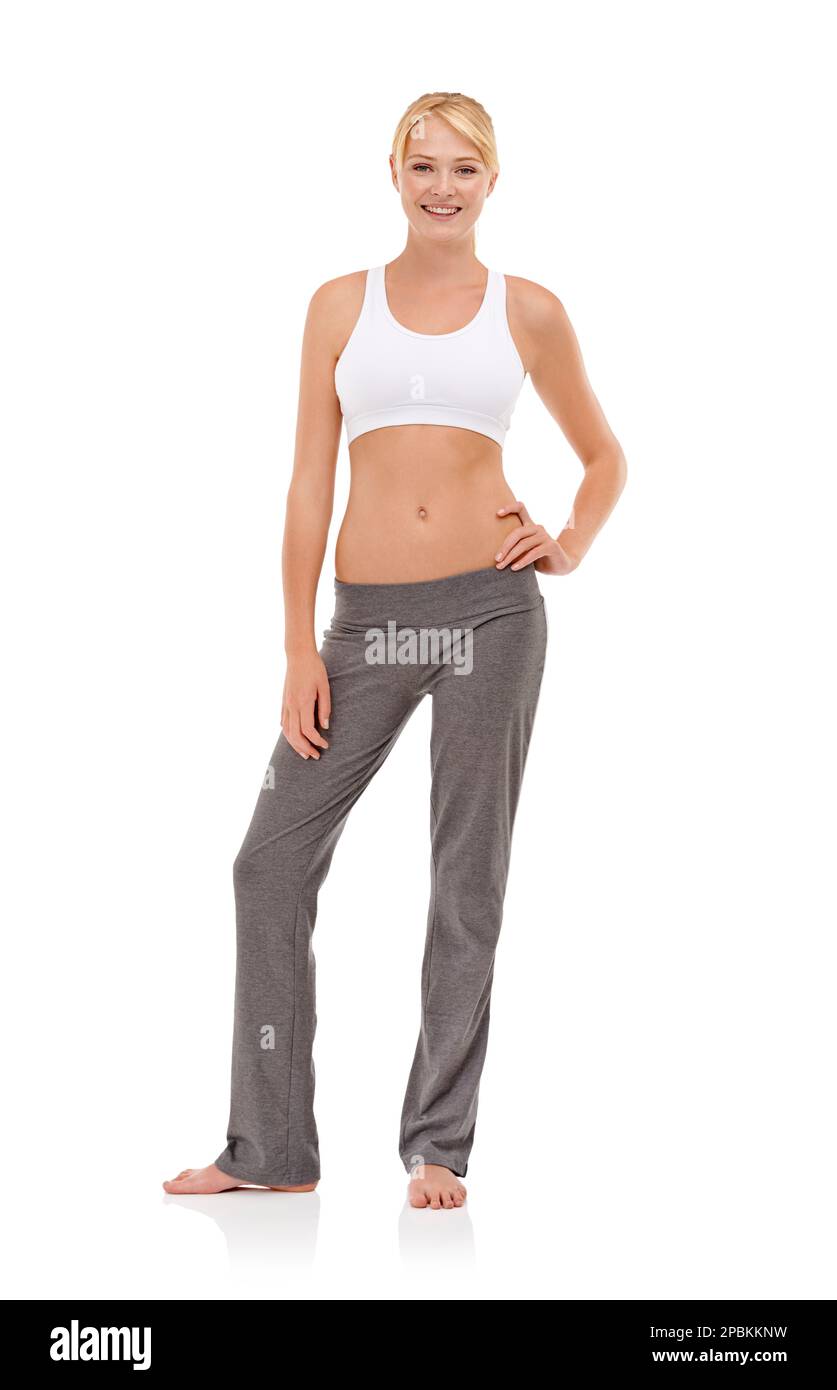 Sporty and confident. Full-length portrait of a sporty young woman standing with her hand on her ...