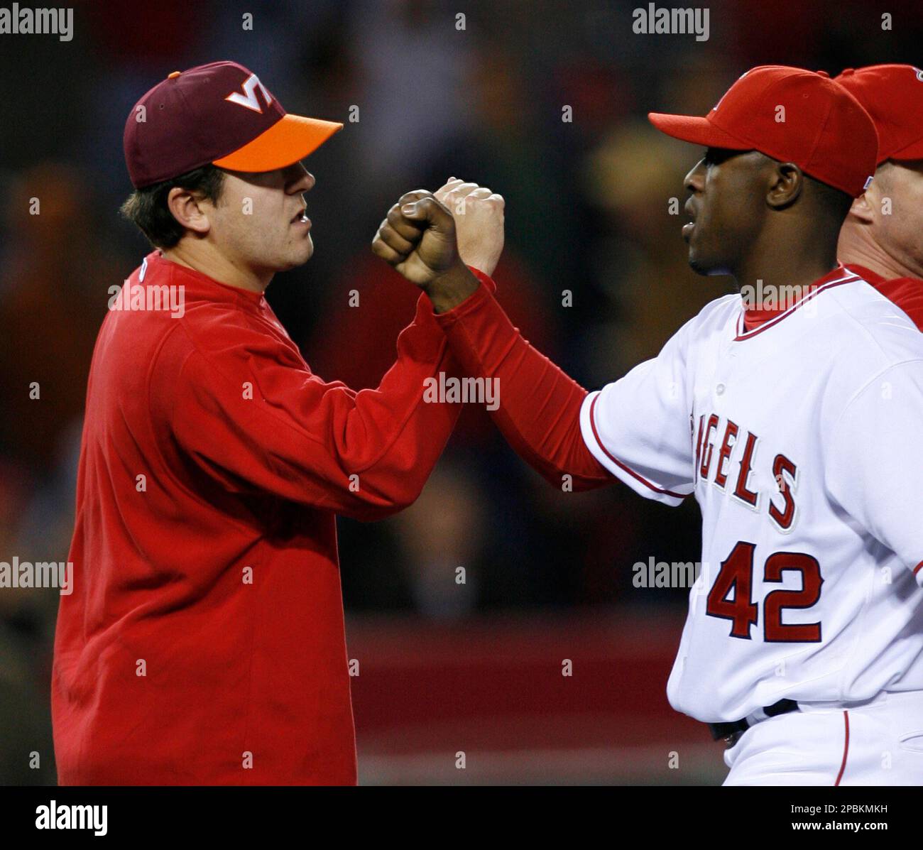 Los Angeles Angels' Joe Saunders, left, and Gary Matthews congratulate ...