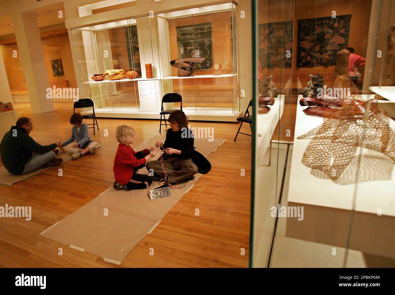 Nicholas Daly, 7, of Milton, Mass., front left, and his mother Wendy ...