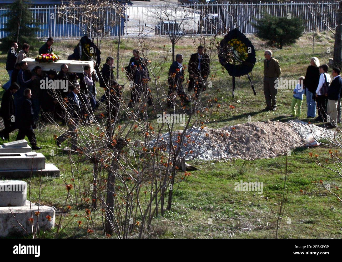 Coffin of the German victim Tilman Geske is carried as is wife and ...