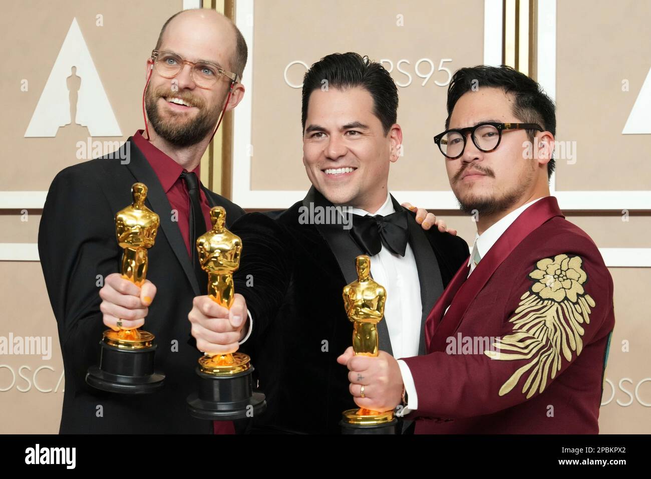 Daniel Scheinert, from left, Jonathan Wang and Daniel Kwan pose with ...