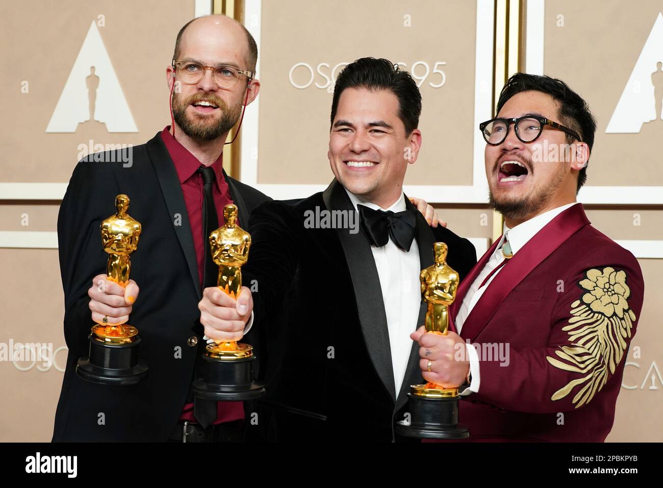 Daniel Scheinert, from left, Jonathan Wang and Daniel Kwan pose with ...