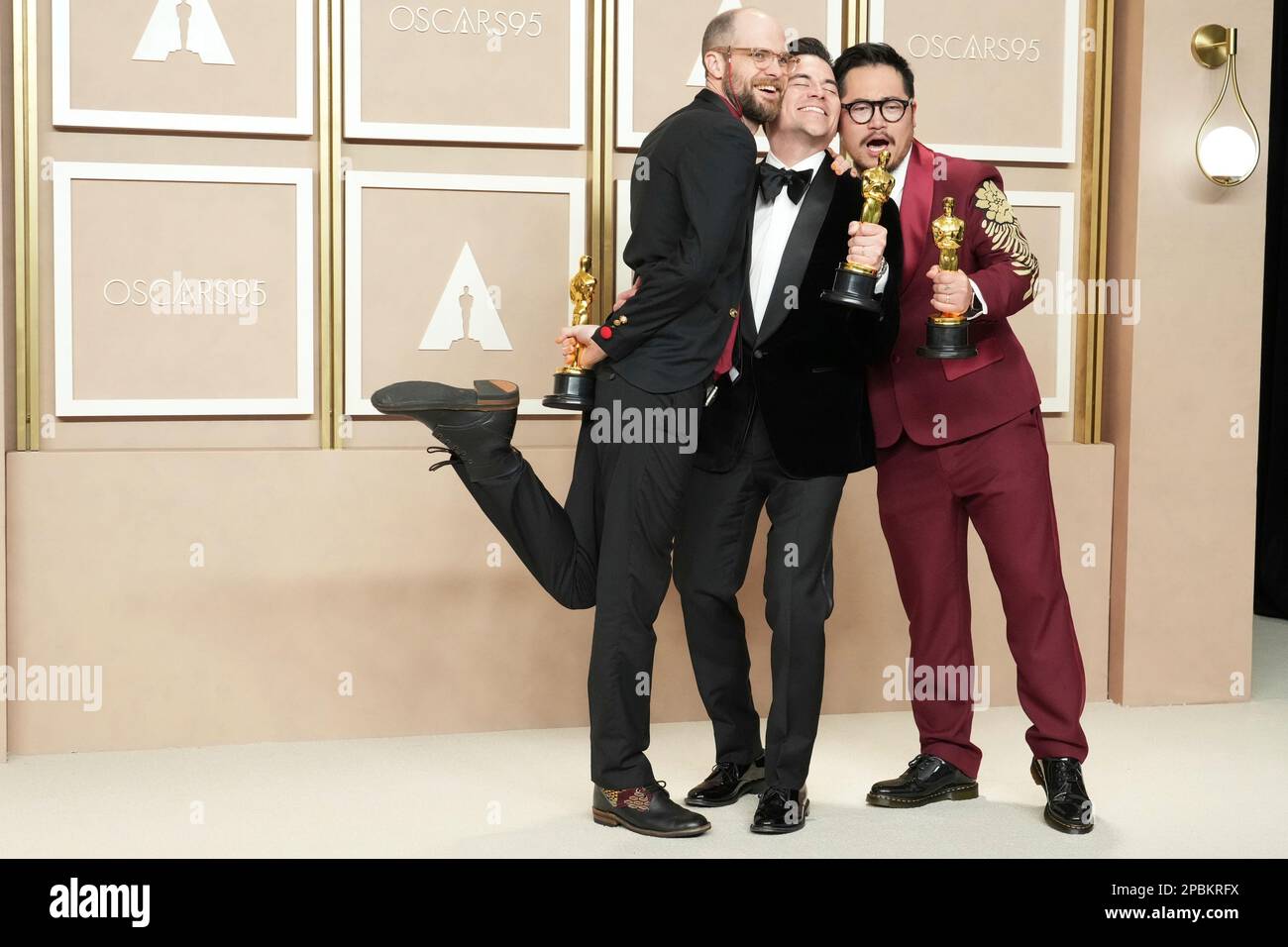 Daniel Scheinert, from left, Jonathan Wang and Daniel Kwan pose with ...