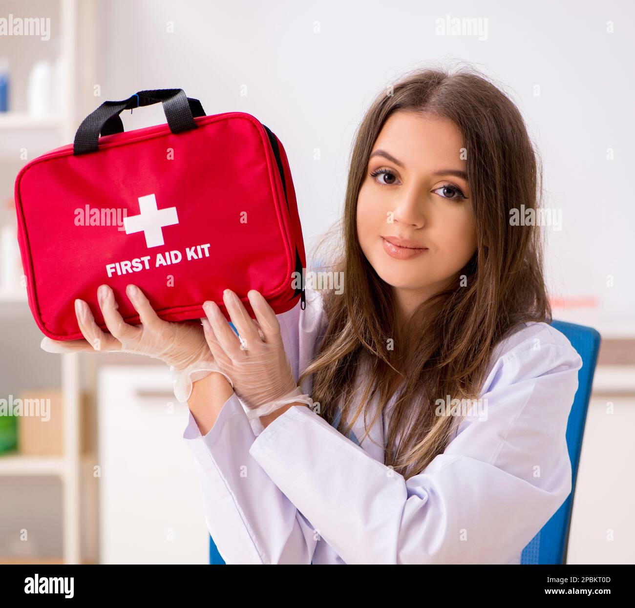 The female beautiful doctor with first aid bag Stock Photo - Alamy