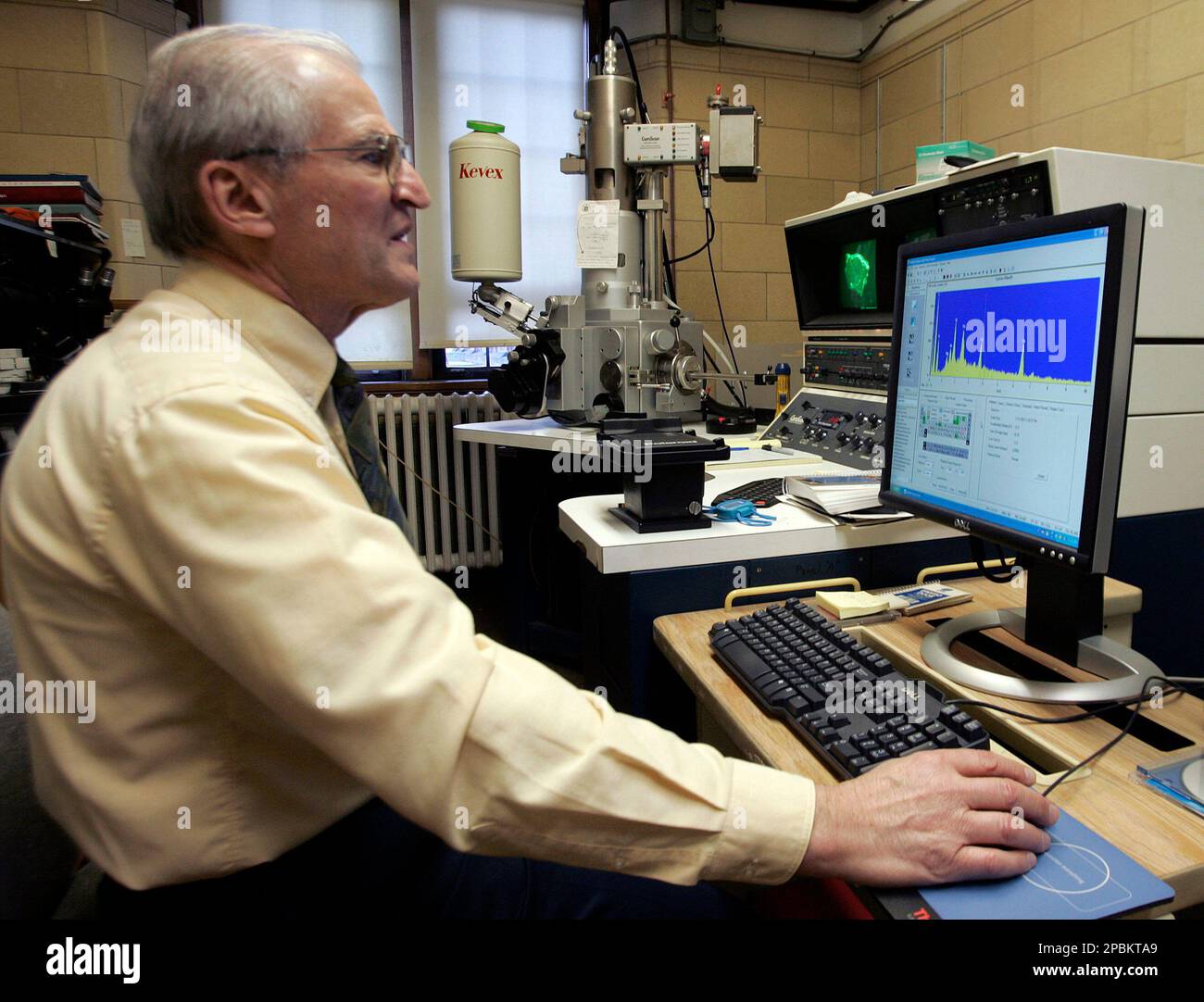 Trinity College chemistry professor Henry DePhillips demonstrates how ...