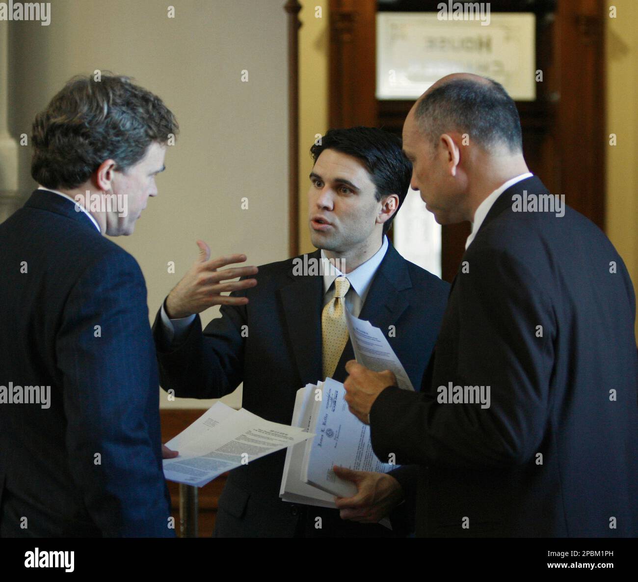 Rep. Patrick Rose, D-Dripping Springs, center, talks to Rep. Dan Branch ...
