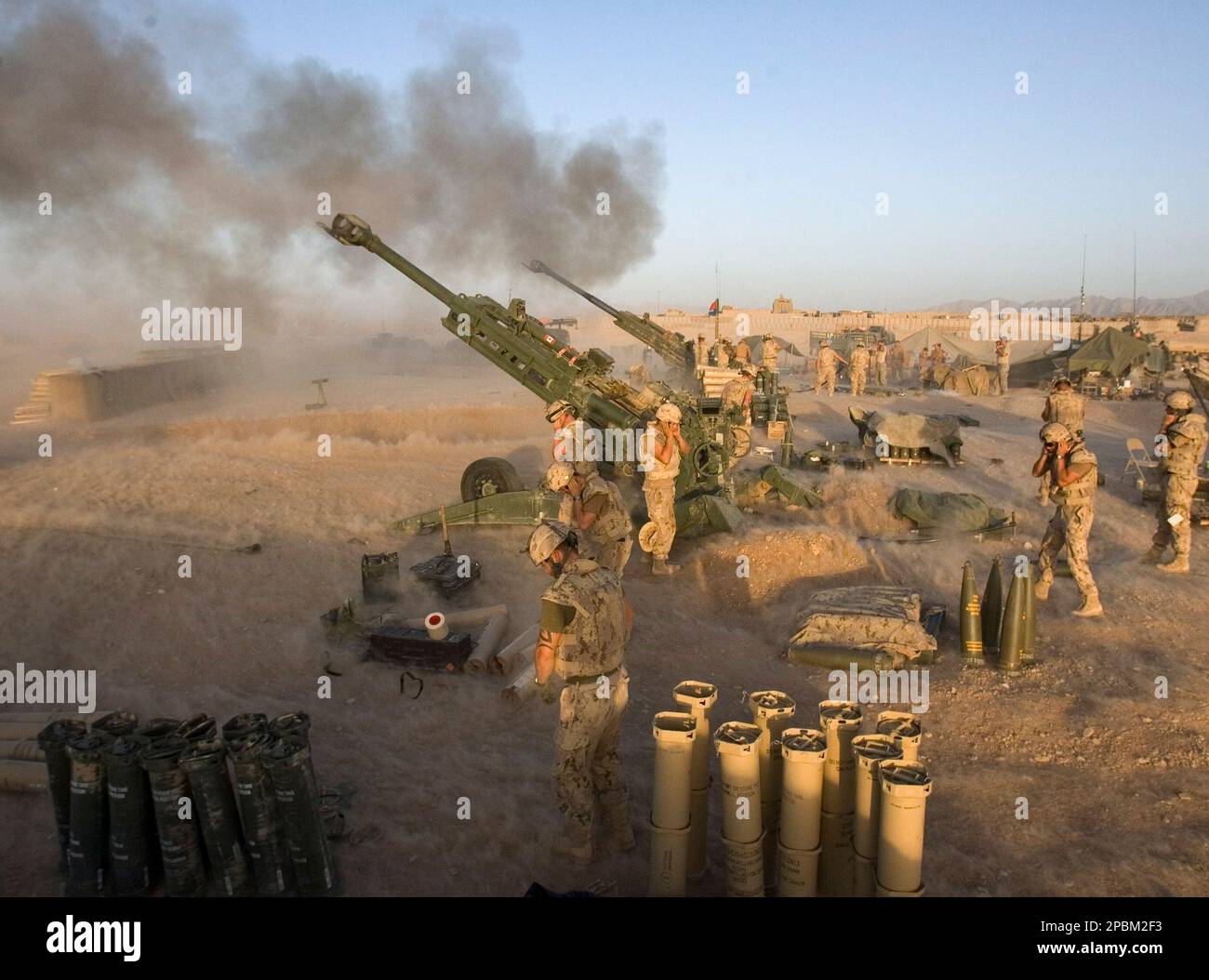 Canadian 2nd Royal Canadian Horse Artillery (RCHA) artillerymen fire ...
