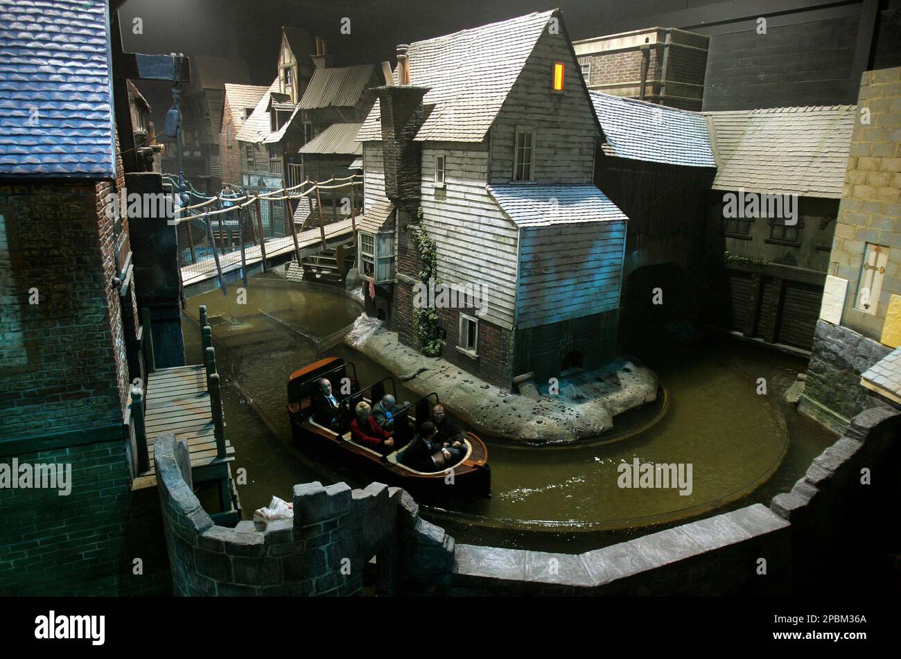 Visitors enjoy a boat trip at the new 'Dickens World', a Charles ...