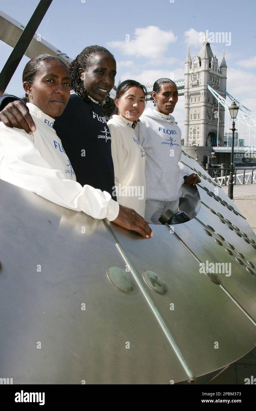 Marathon runners, from left, Geta Wami of Ethopia, Lornah Kiplagat of ...