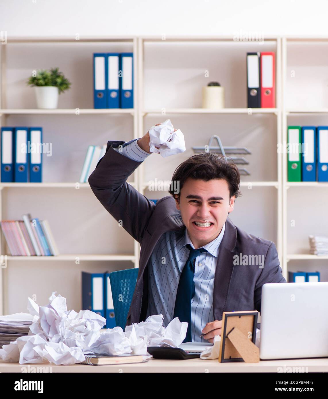 The businessman rejecting new ideas with lots of papers Stock Photo - Alamy