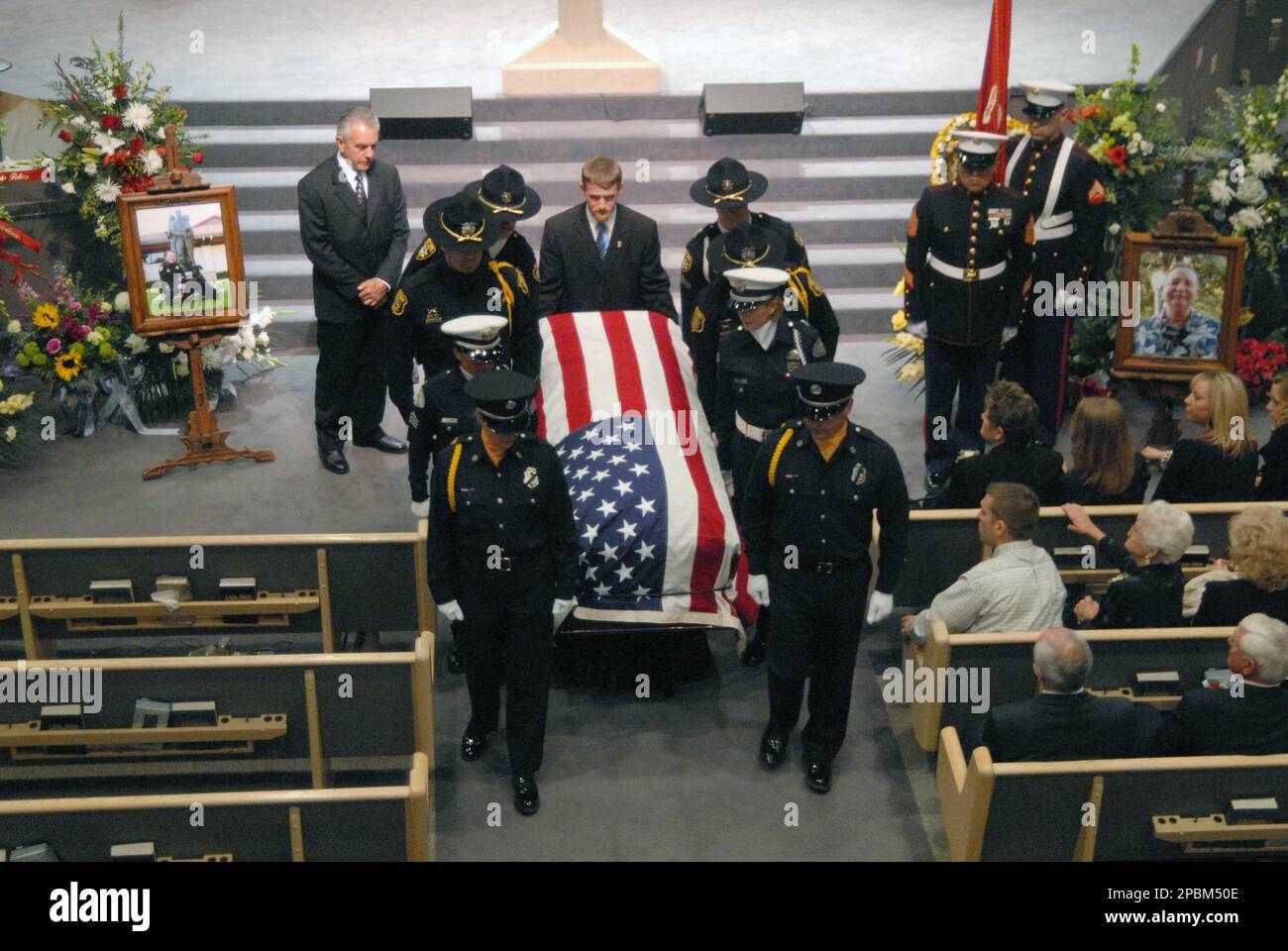 Fellow officers carry the casket of fallen Ripon Police officer Robert ...