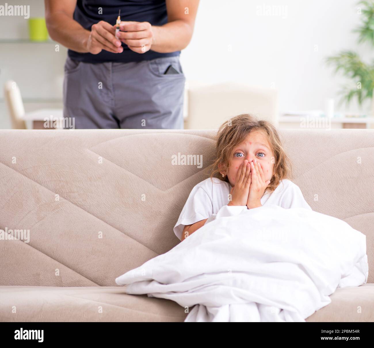 The father taking care of his ill daughter Stock Photo - Alamy