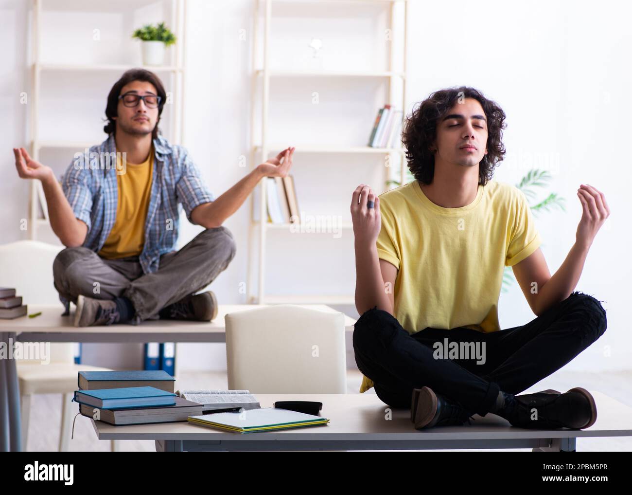 The two male students in the classroom Stock Photo - Alamy