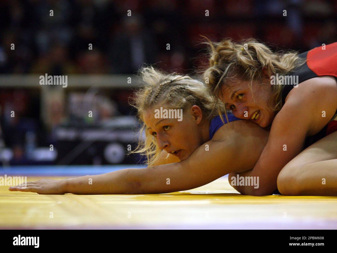 Aurelie Gerlac of France, right, grapples with Germany's Maria Muller ...