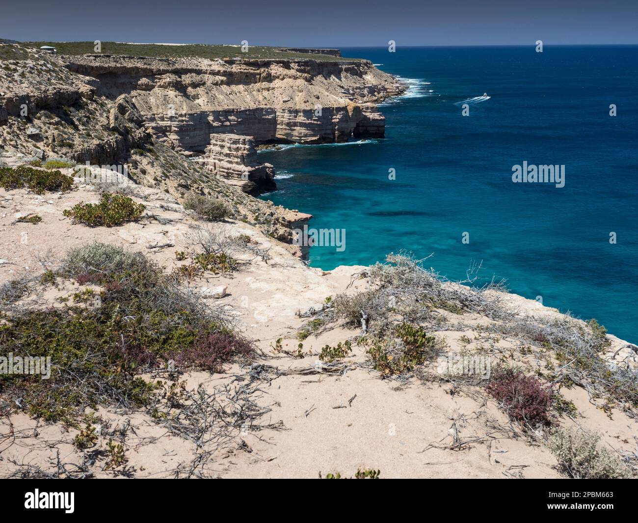 Crumbling limestone clifftops above the relentless Indian Ocean ...