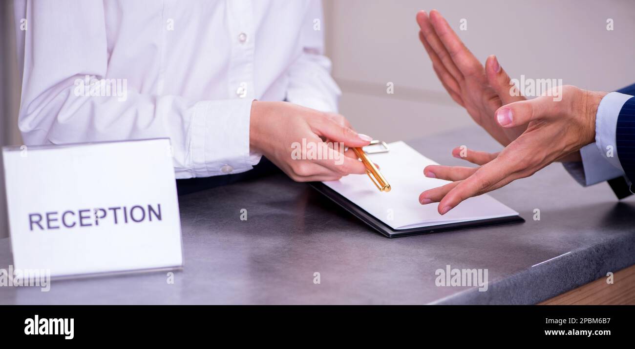 The hotel reception bell at the counter Stock Photo - Alamy