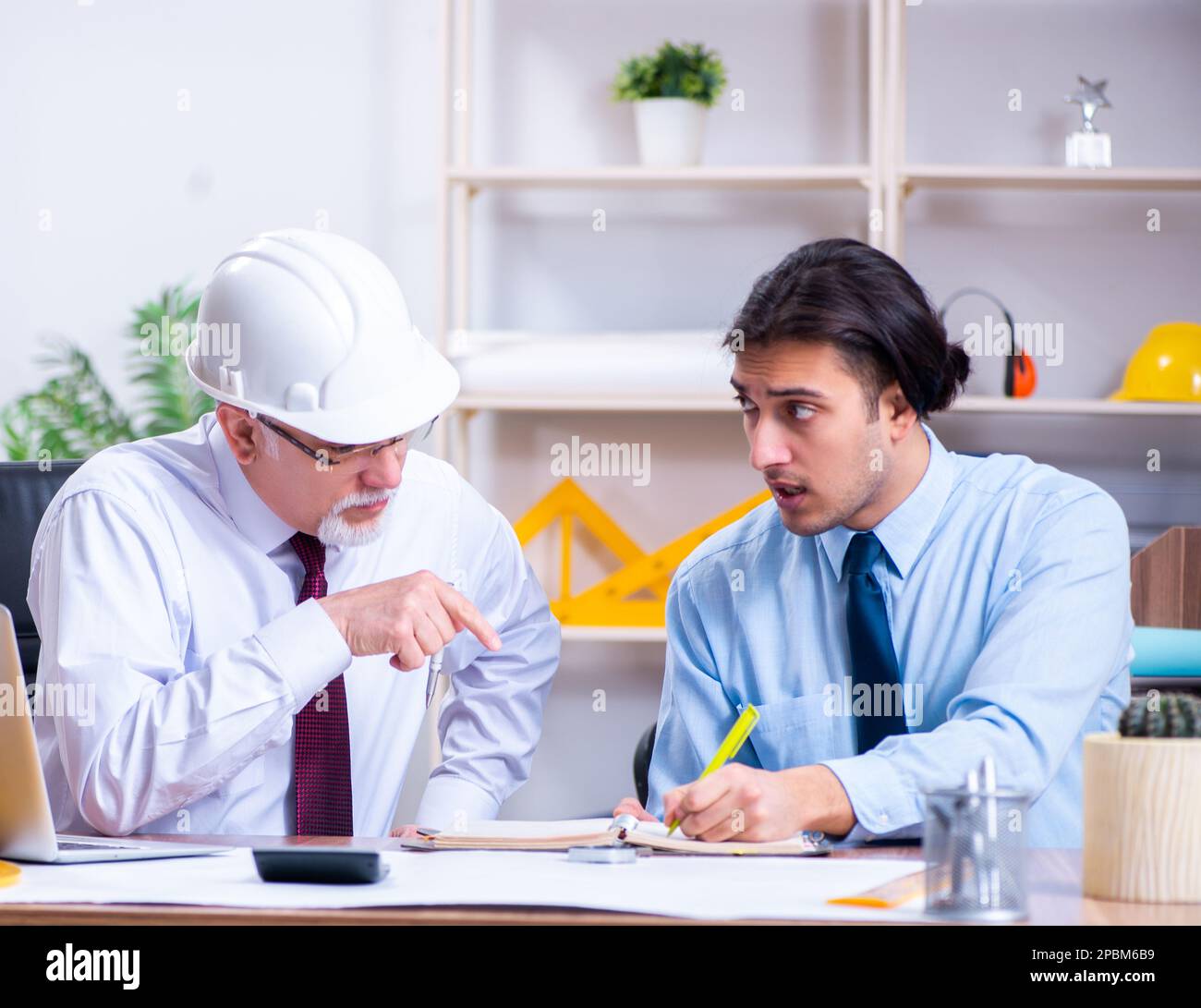 The two architects working on the project Stock Photo - Alamy
