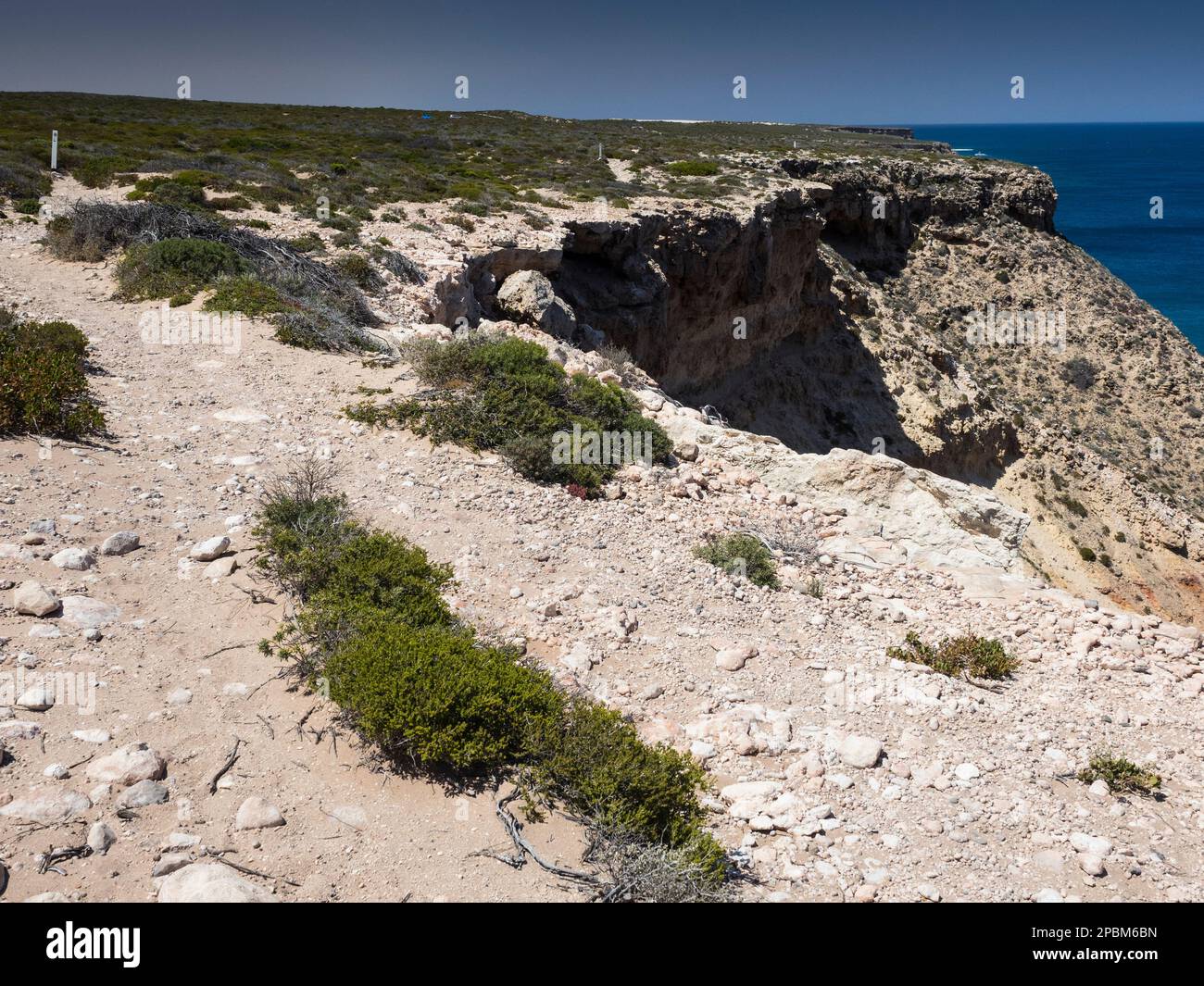 Crumbling limestone clifftops above the relentless Indian Ocean ...