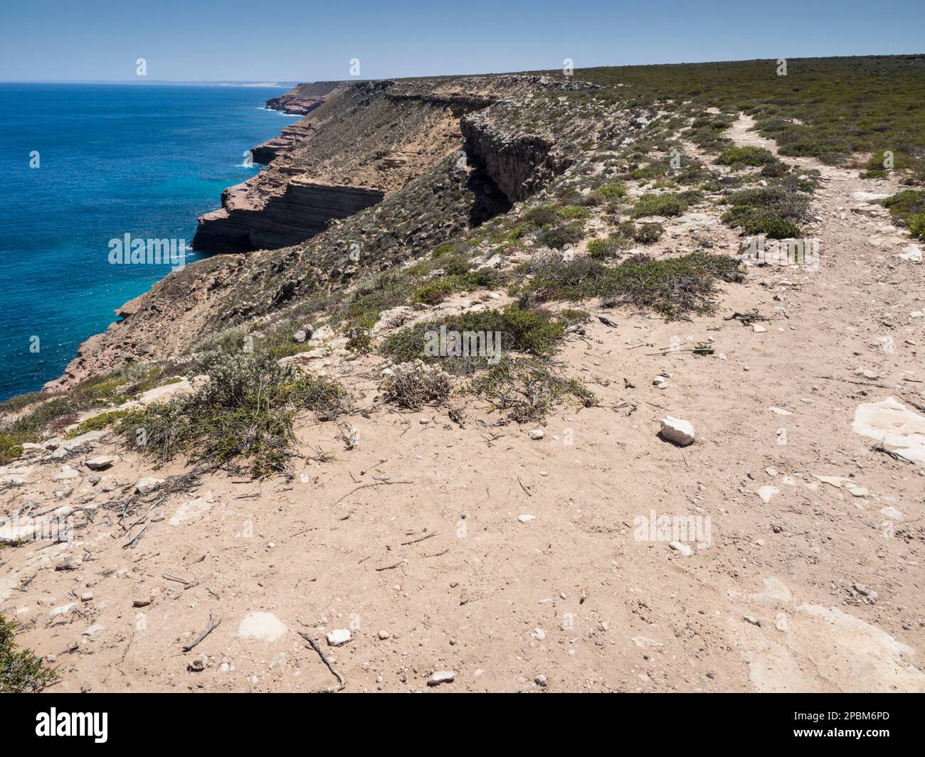 Crumbling limestone clifftops above the relentless Indian Ocean ...