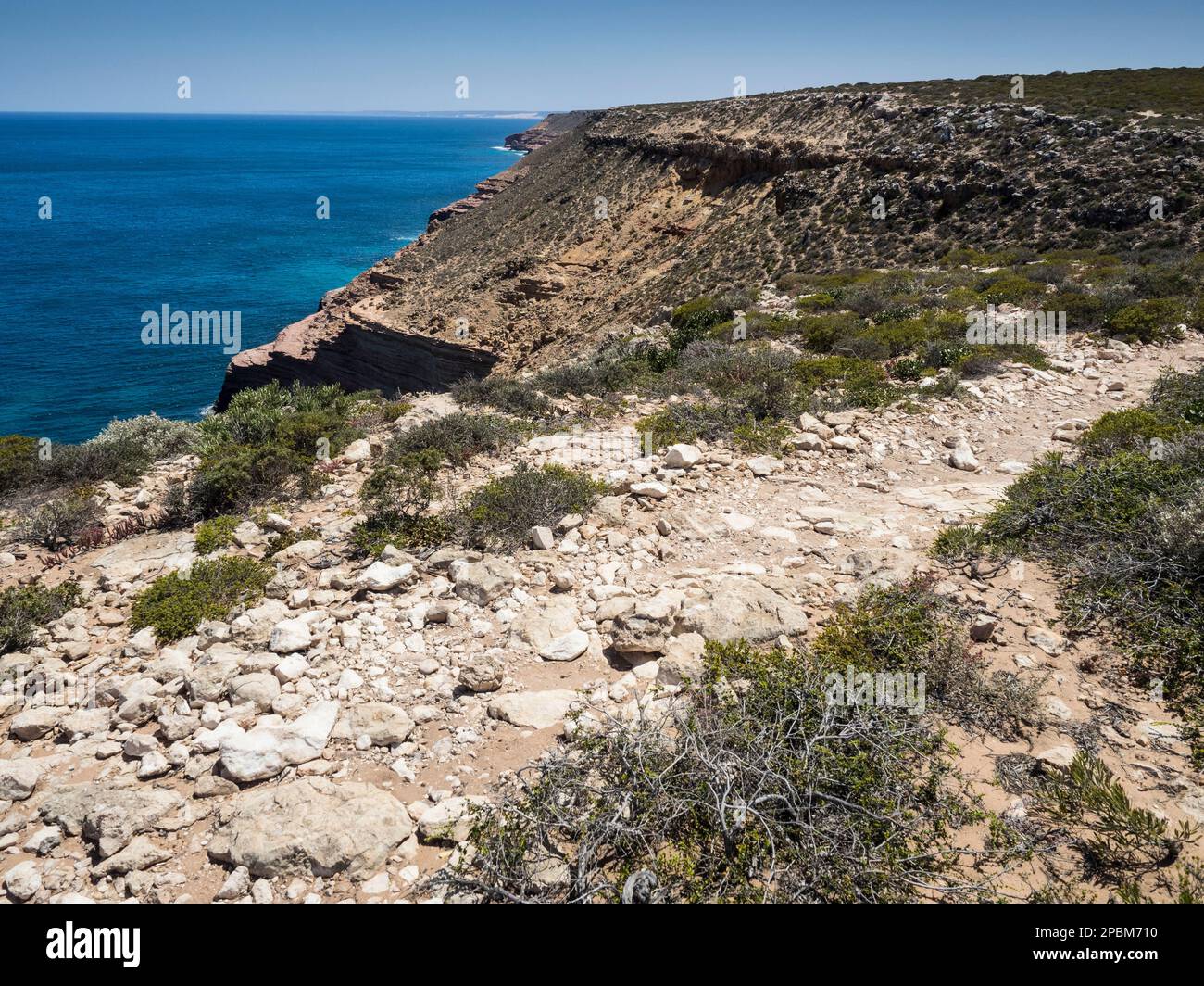Crumbling limestone clifftops above the relentless Indian Ocean ...