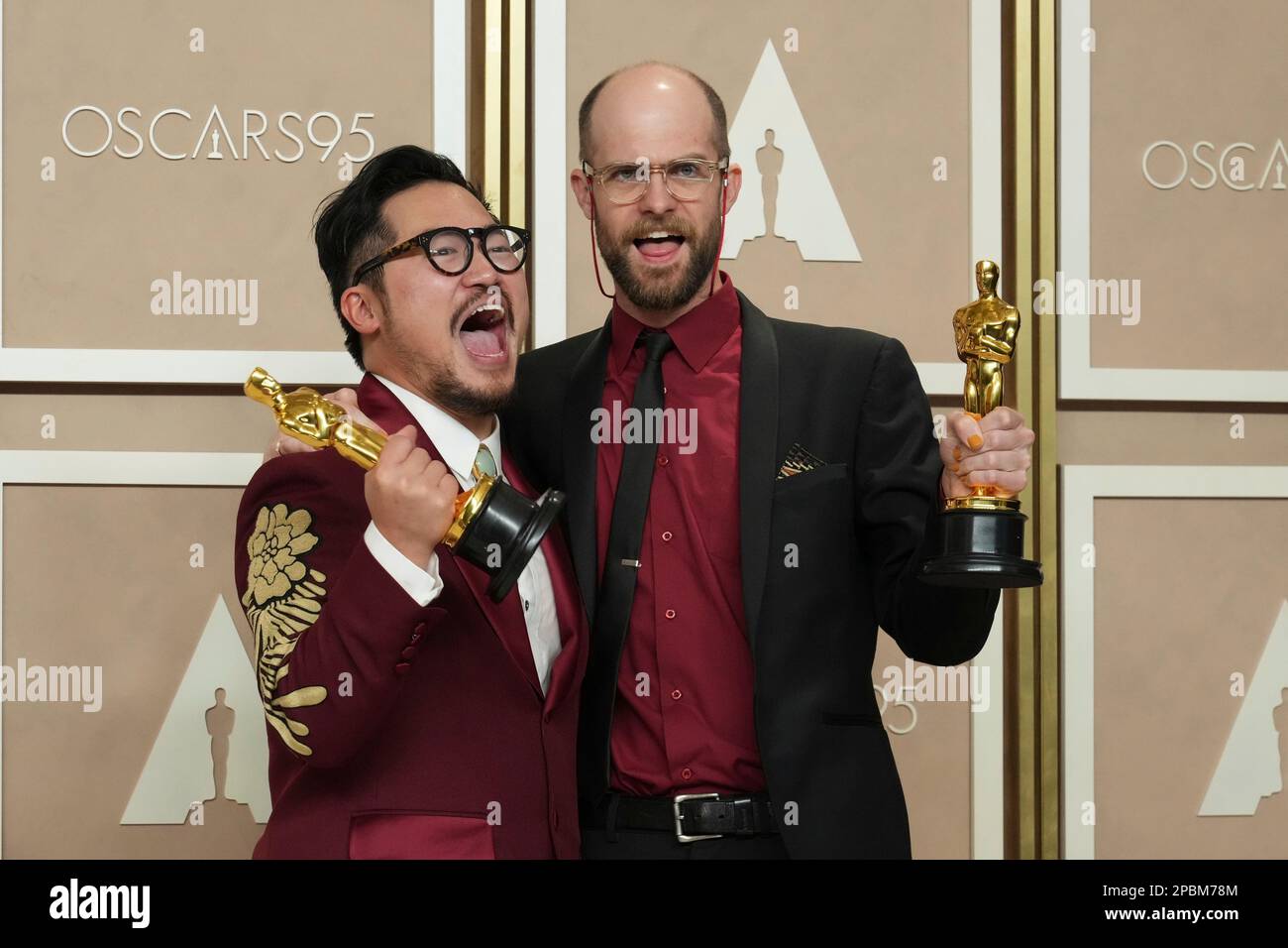 Daniel Kwan, left, and Daniel Scheinert pose with the award for best ...