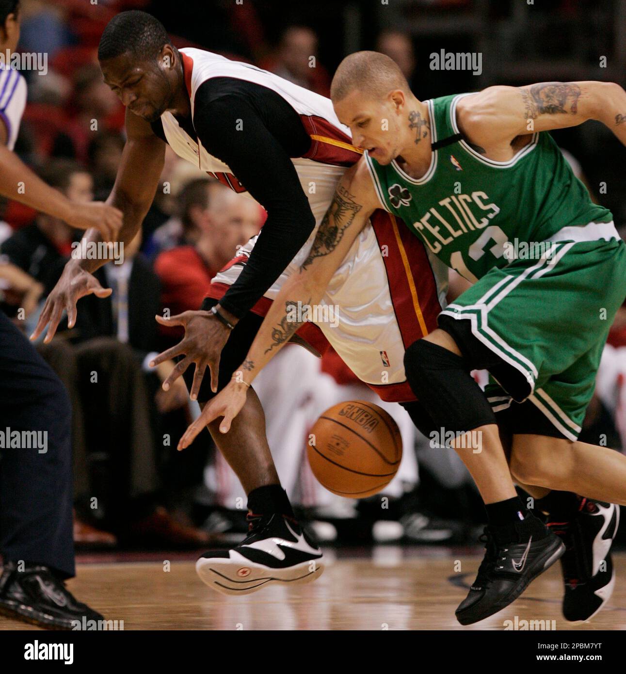 Miami Heat guard Dwyane Wade, left, and Boston Celtics guard Delonte ...