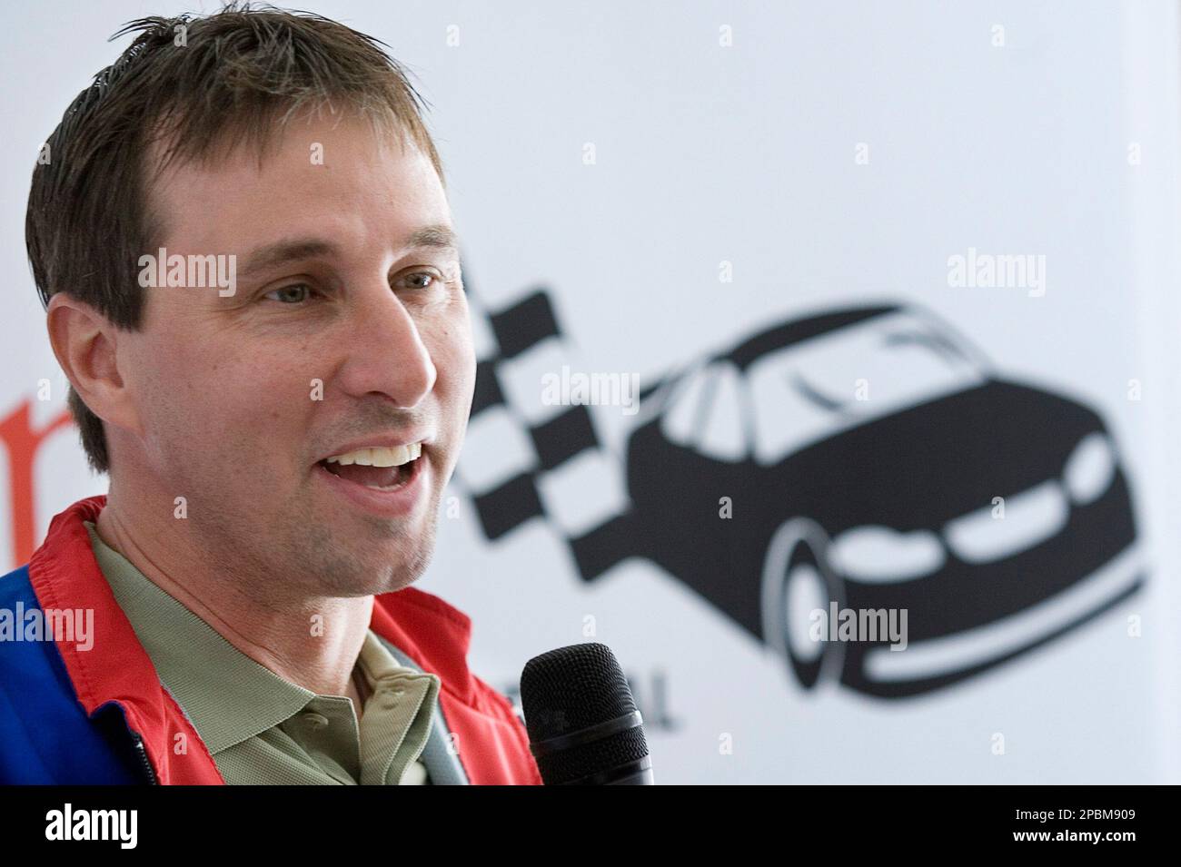 NASCAR driver David Reutimann responds to questions during a news ...