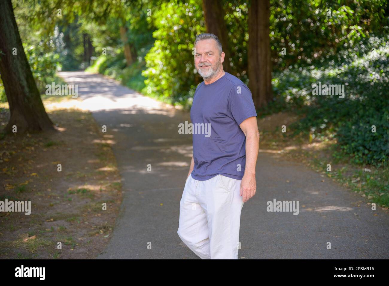Bearded man walking hi-res stock photography and images - Alamy