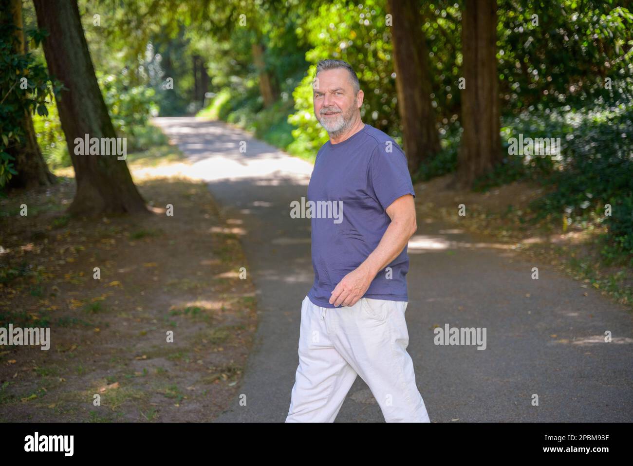Bearded man walking in hi-res stock photography and images - Alamy