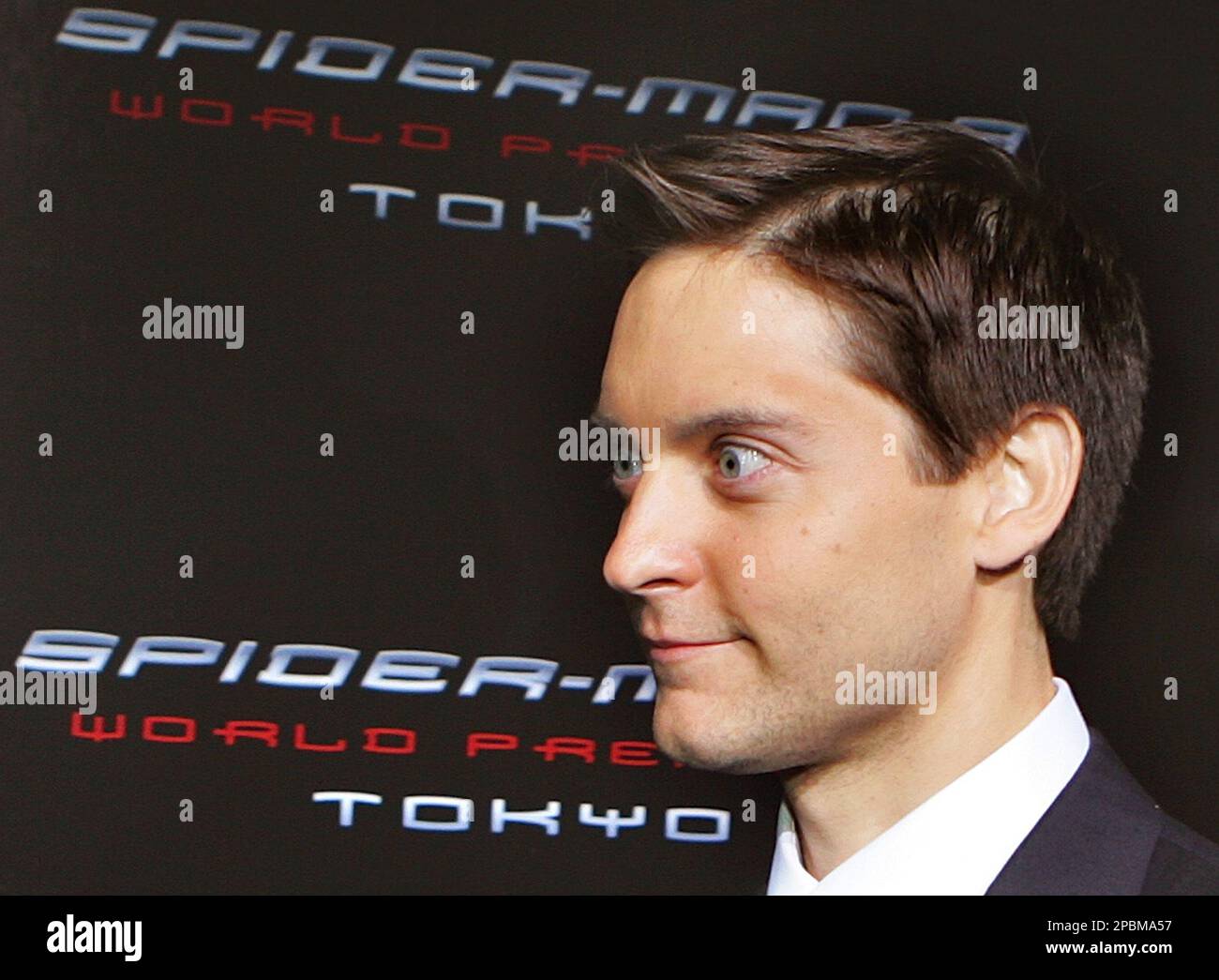 Tobey Maguire, the main actor of "Spider-Man 3," stares at a TV camera ...