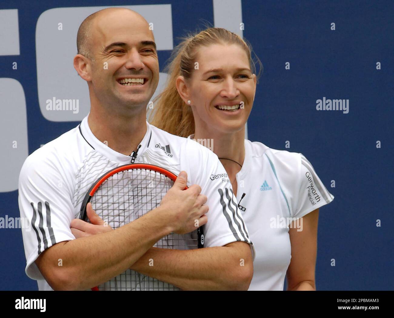 ** FILE ** Tennis greats Andre Agassi, left, and his wife Steffi Graf ...