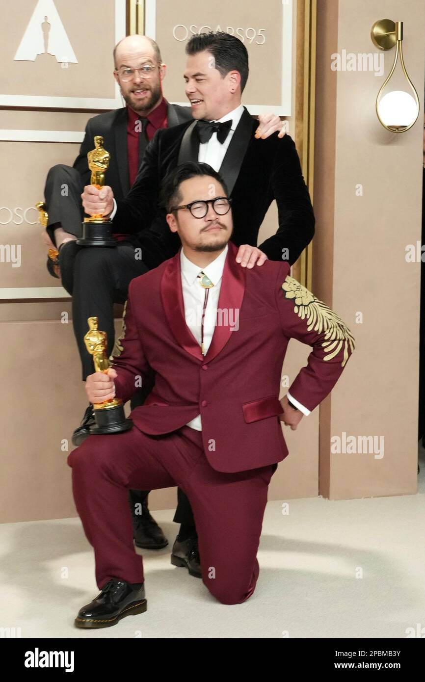 Daniel Scheinert, from left, Jonathan Wang and Daniel Kwan pose with ...